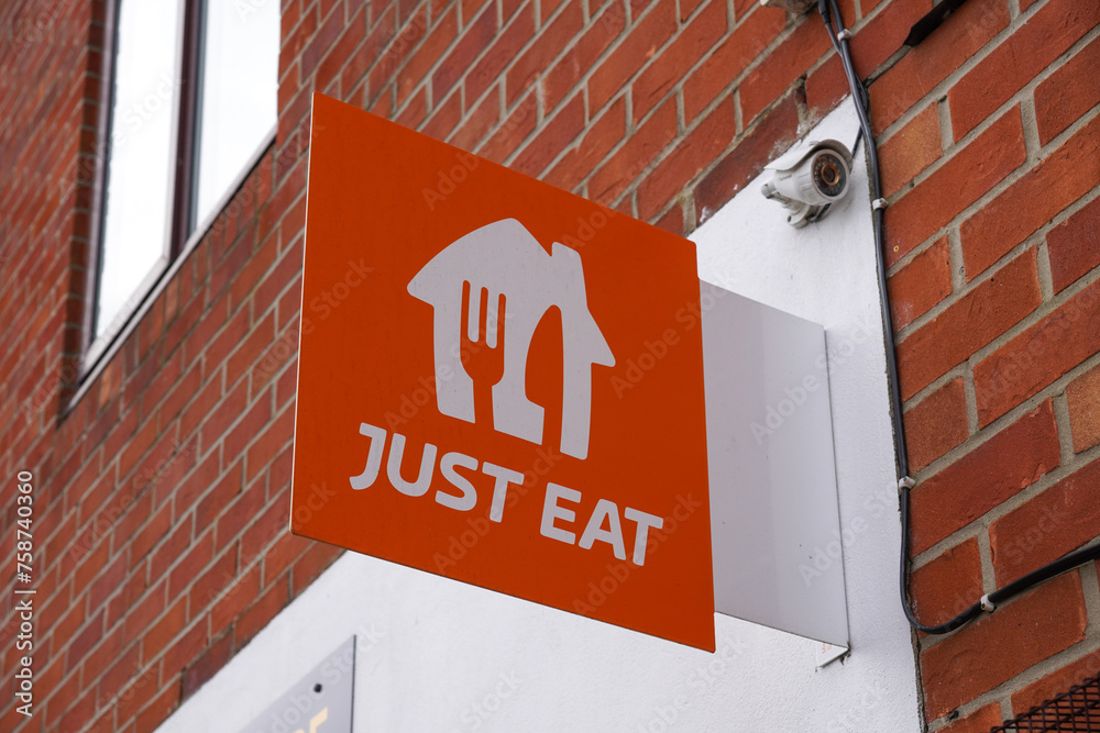 Southampton England 13 March 2024 - Just Eat logo on sign outside ...