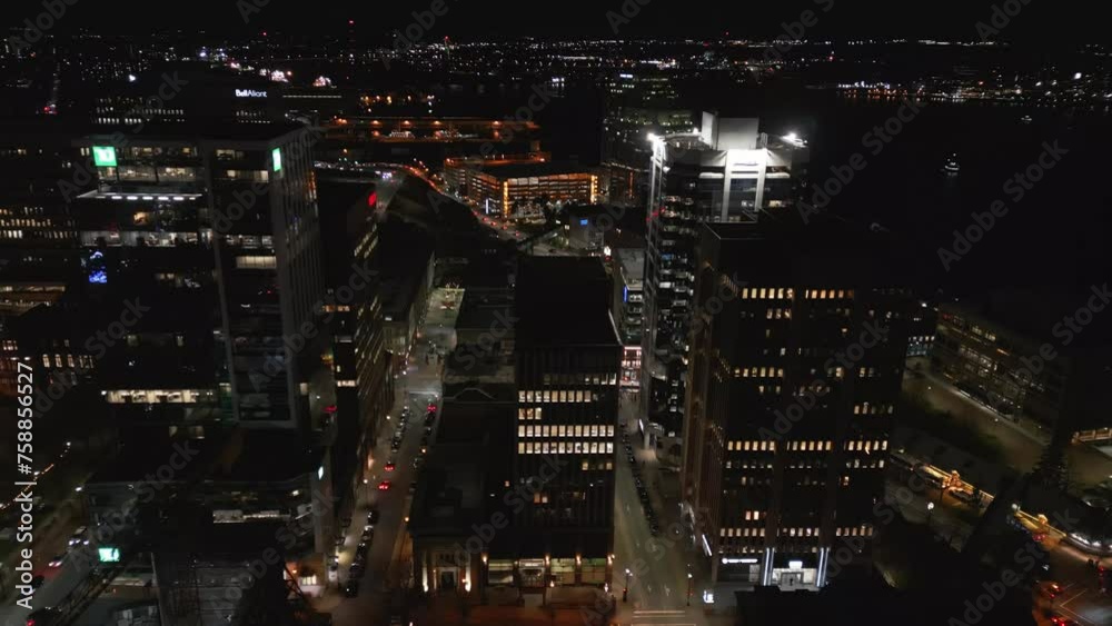 Vidéo Stock Cinematic drone view of a night city with cars and ...