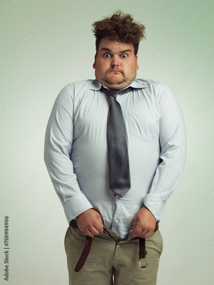 Man, portrait and shocked with plus size pants or big waist in obesity ...