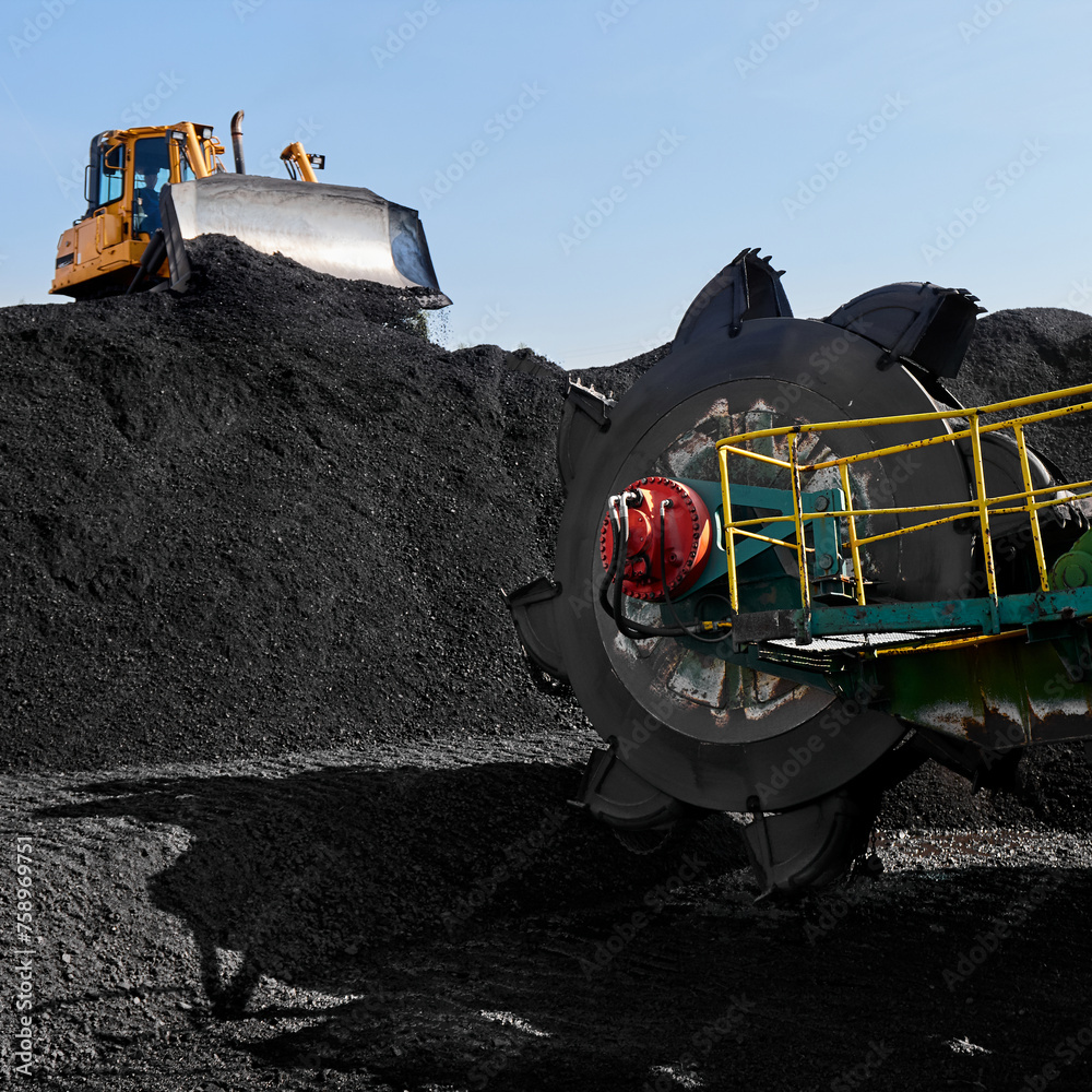 Loader and excavator for loading coal, coal heaps at the mine. Stock ...