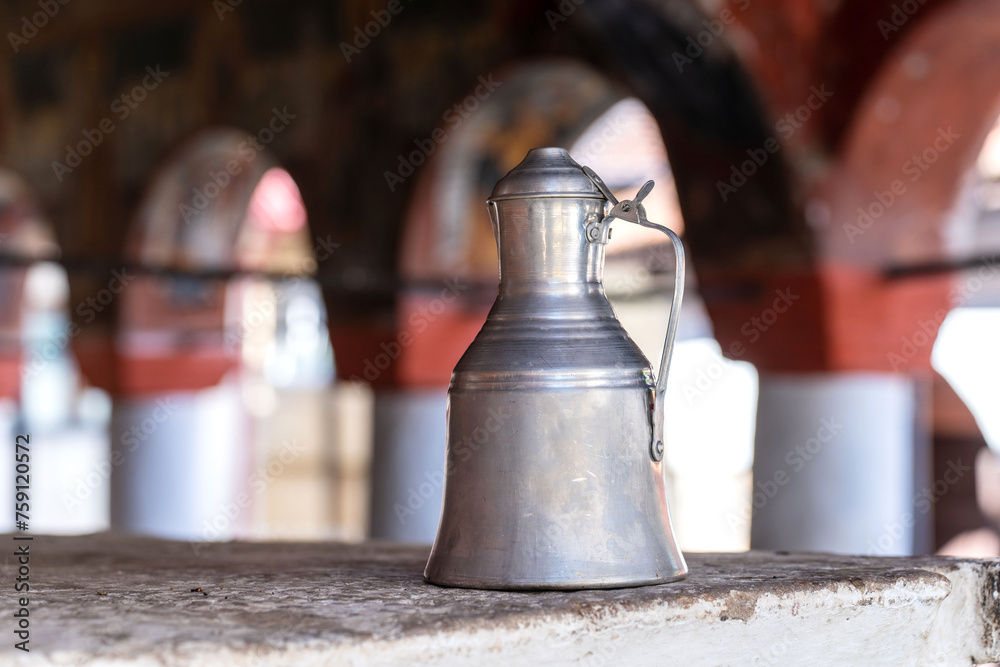 Vintage Macedonian milk container. Silver shine color. Arch frame ...