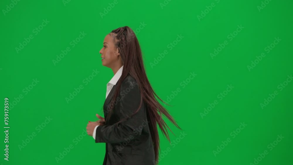 Female reporter isolated on chroma key green screen background. African ...