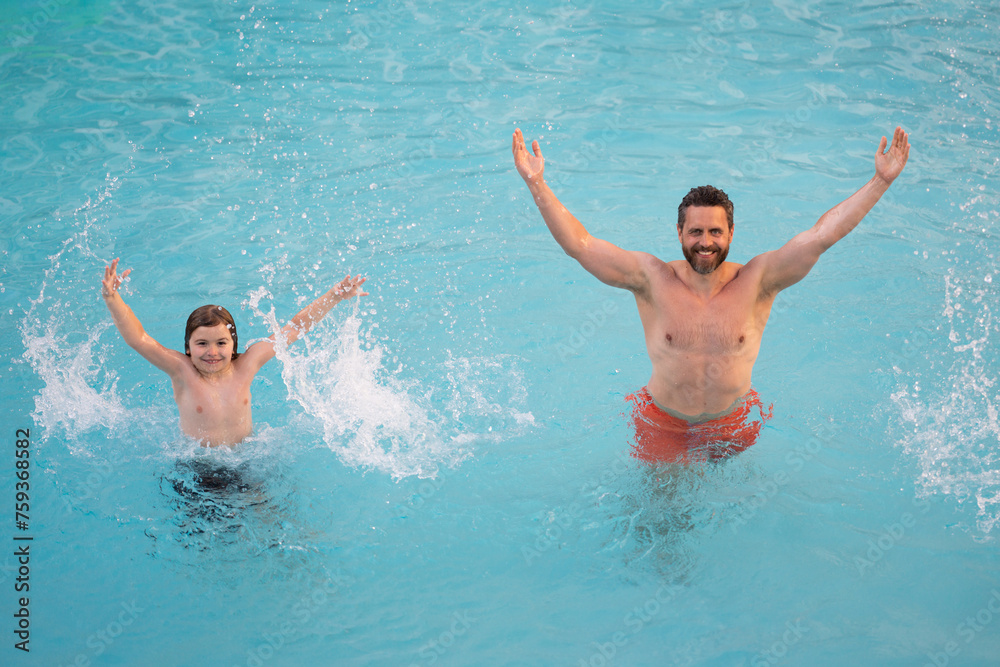 Father and son swimming in pool, summer family weekeng. Little kid boy ...