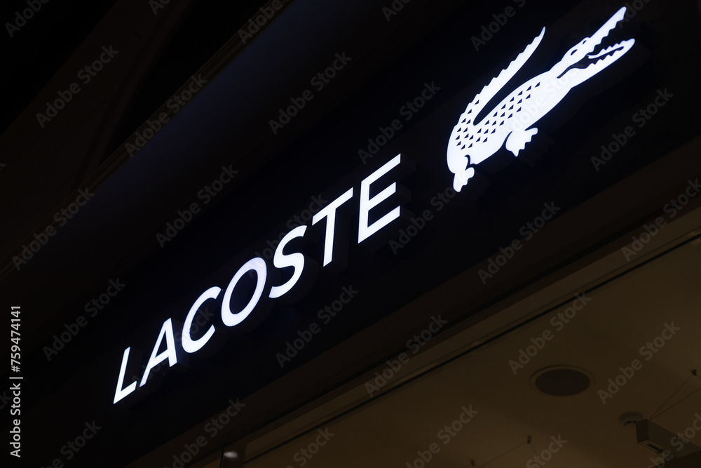 Pattaya, Thailand - 23 December, 2023: glowing Lacoste sign with ...