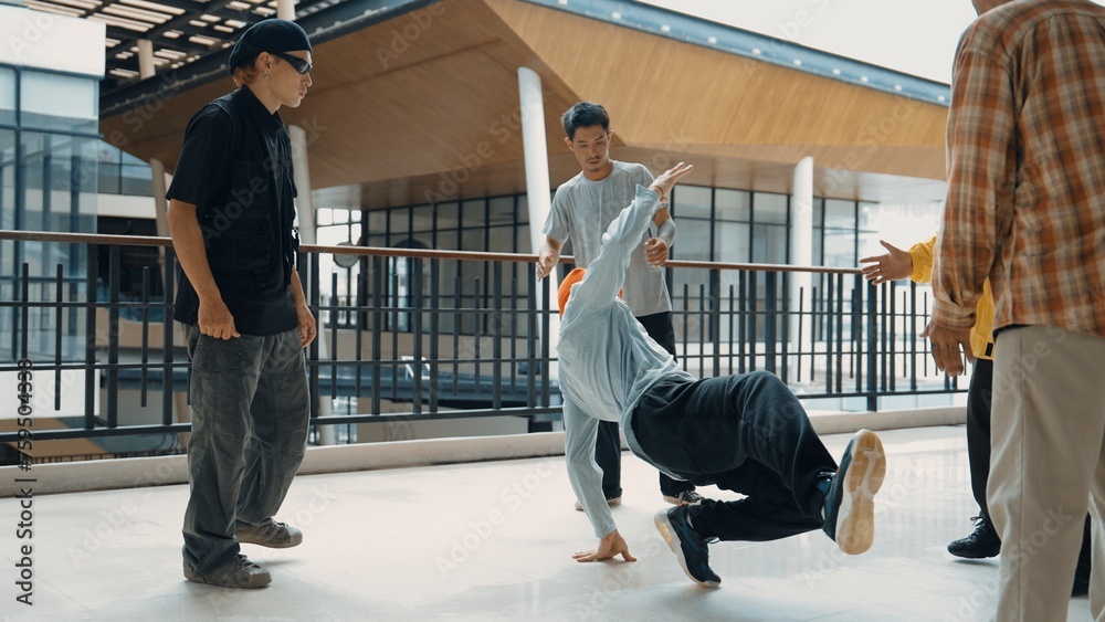 Hip hop team dance break dance while multicultural friend surrounded ...