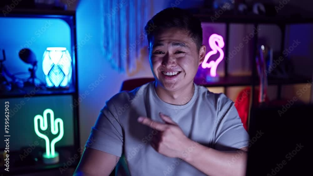 Cheerful chinese streamer guy, a glimpse of joyous gaming night inside ...