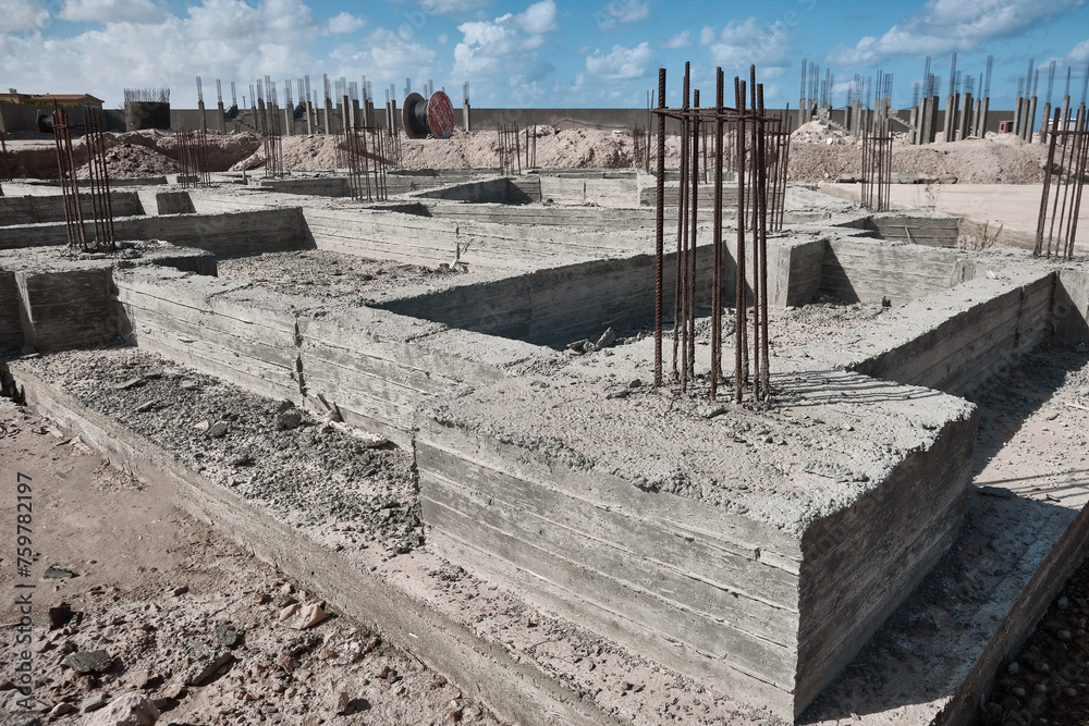Rough concrete foundation and reinforcement vertical rebars of ...