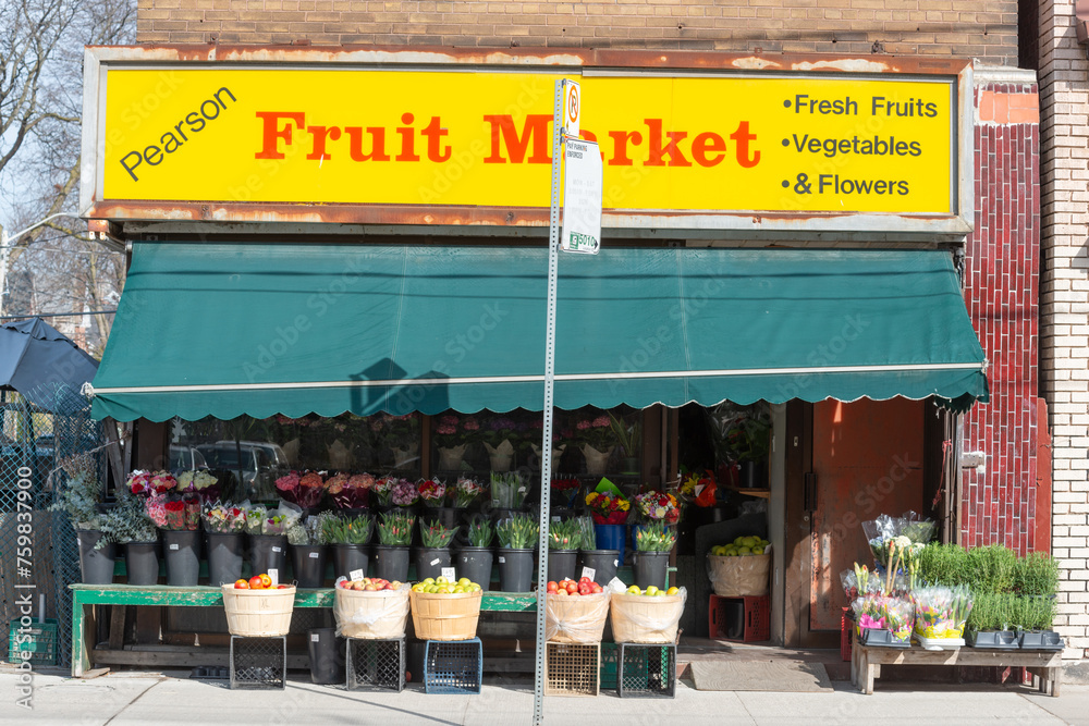 exterior building facade and sign of Pearson Fruit & Vegetables, a ...