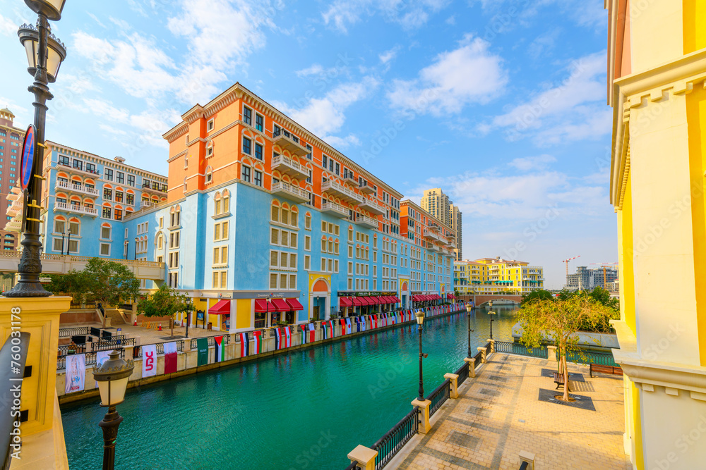 Canal view of the Qanat Quartier, a colorful Venetian inspired ...