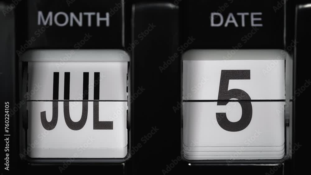 retro flip calendar with a date change from the fourth of July to the ...