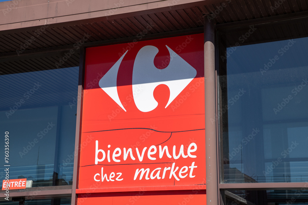 Carrefour market logo text and brand sign city center store entrance ...