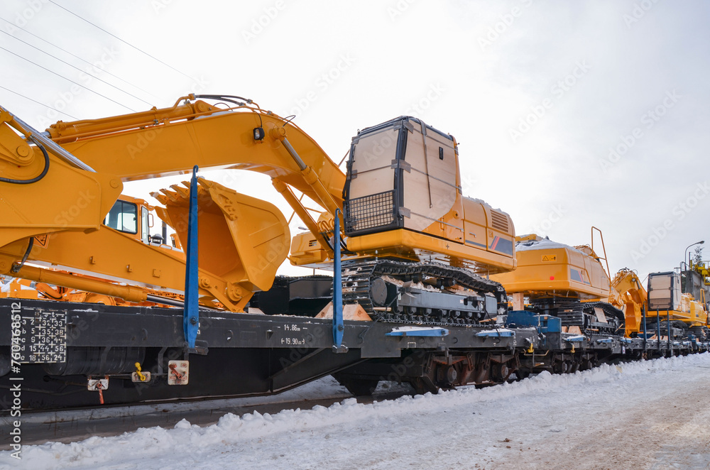Excavators crawler transported by rail. Crawler dozers secured for rail ...