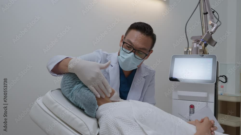 Side view of asian woman getting resurfacing laser fraxel dual and ...