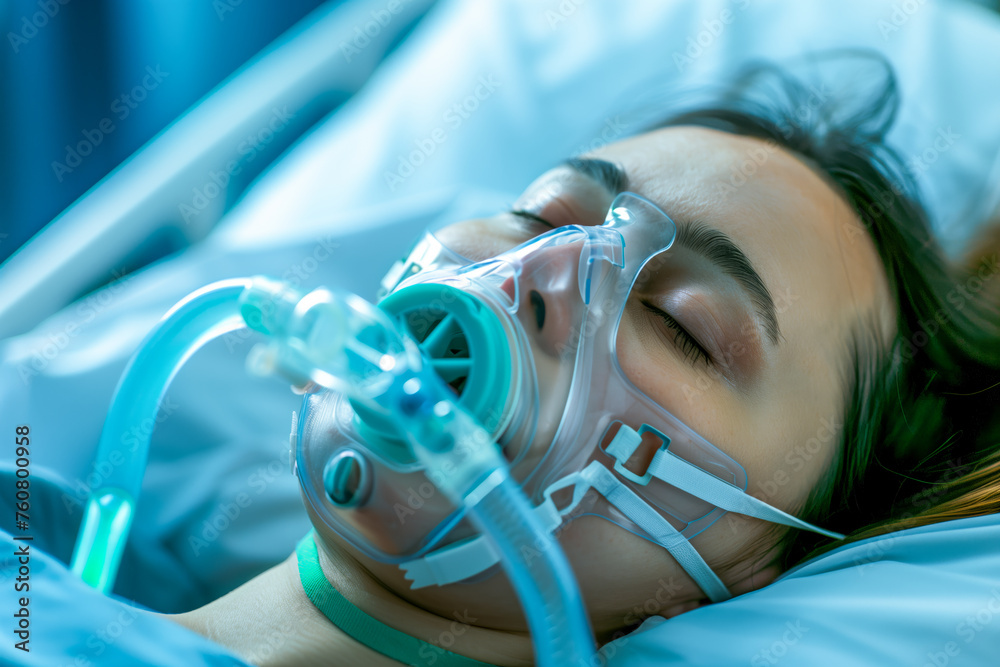woman patient wearing oxygen mask sleeping on hospital bed, Pre ...