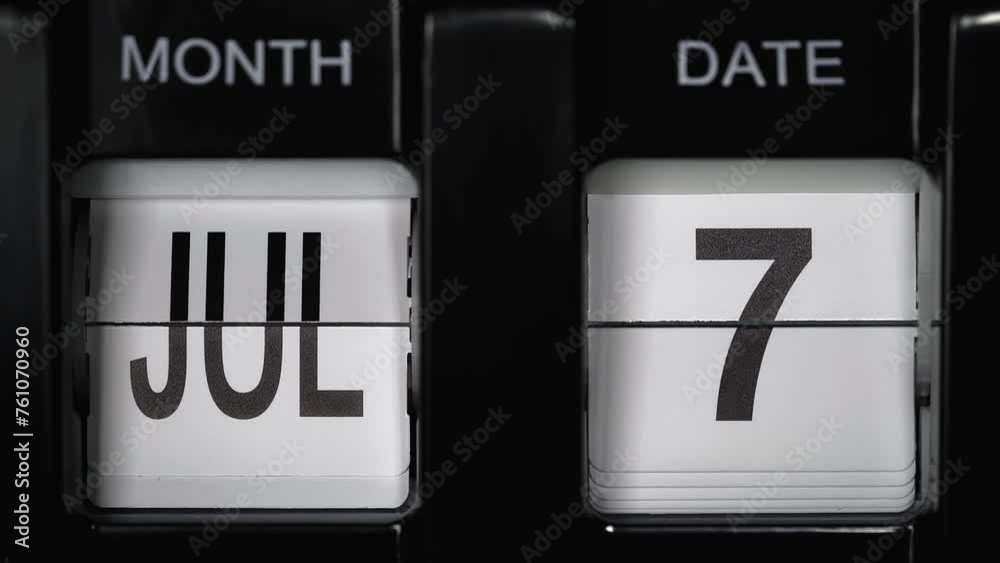 retro flip calendar with a date change from the sixth of July to the ...