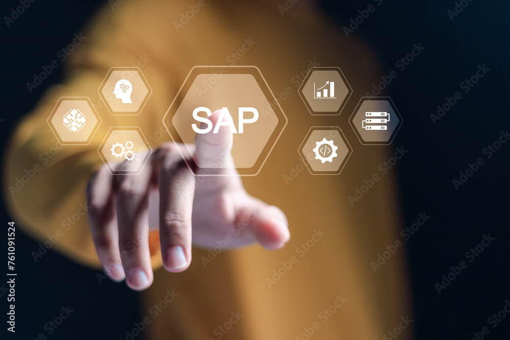 SAP, ERP enterprise resources planning system concept. Person touching SAP word on virtual ...