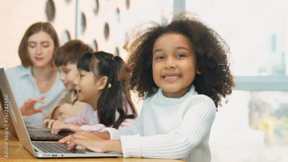 Smart teacher check student answer while learner using laptop to doing ...