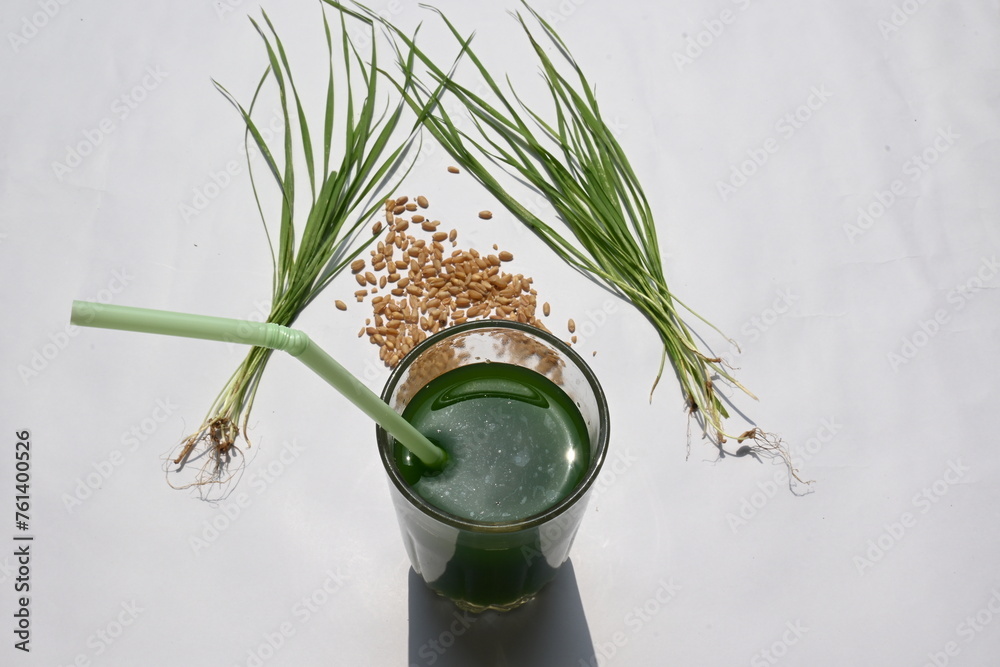 Wheatgrass juice on white background. Healthy organic green detox juice ...