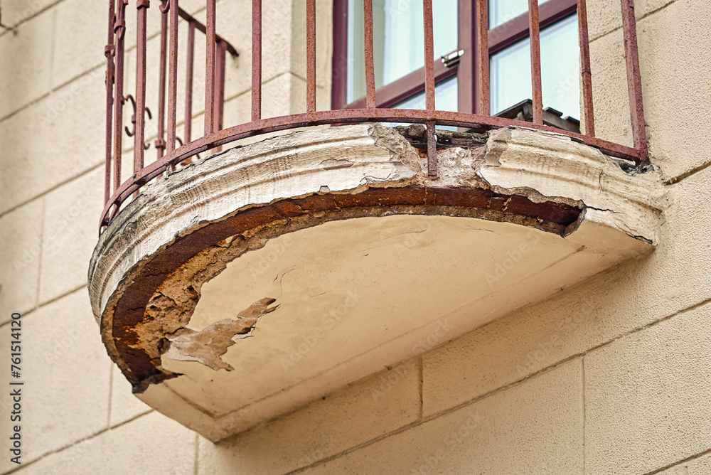 Damaged balcony of an old historic building. Damaged balcony floor ...