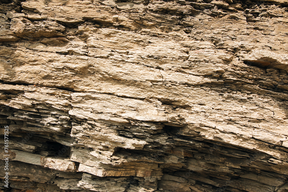 Uneven, rough stone texture, retractable rock close-up. Natural ...