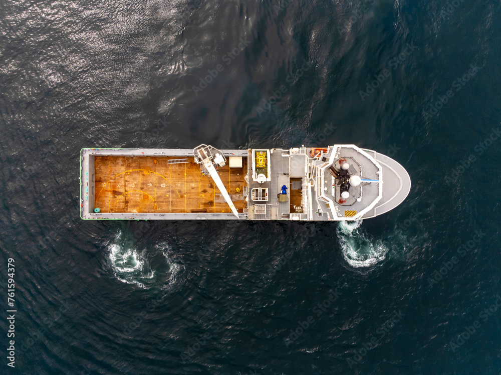 ASD Offshore supply vessel from above, testing propulsion. Aft azimuth ...