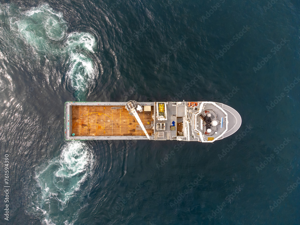 ASD Offshore supply vessel from above, testing propulsion. Aft azimuth ...