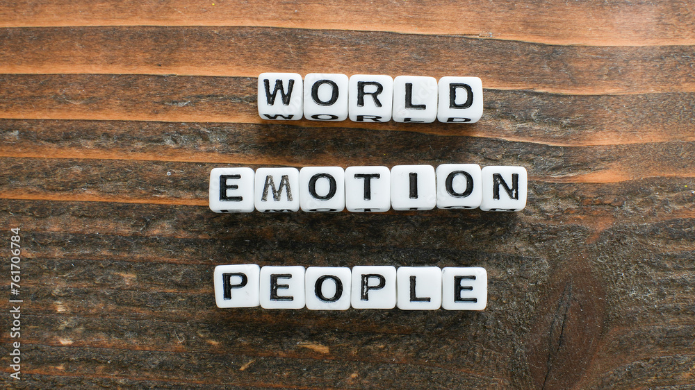 Cubed letter beads with black lettering spell out the words World ...