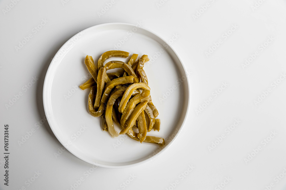 Marinated pickled cactus. Mexican cuisine. Pickled opuntia isolated, on ...