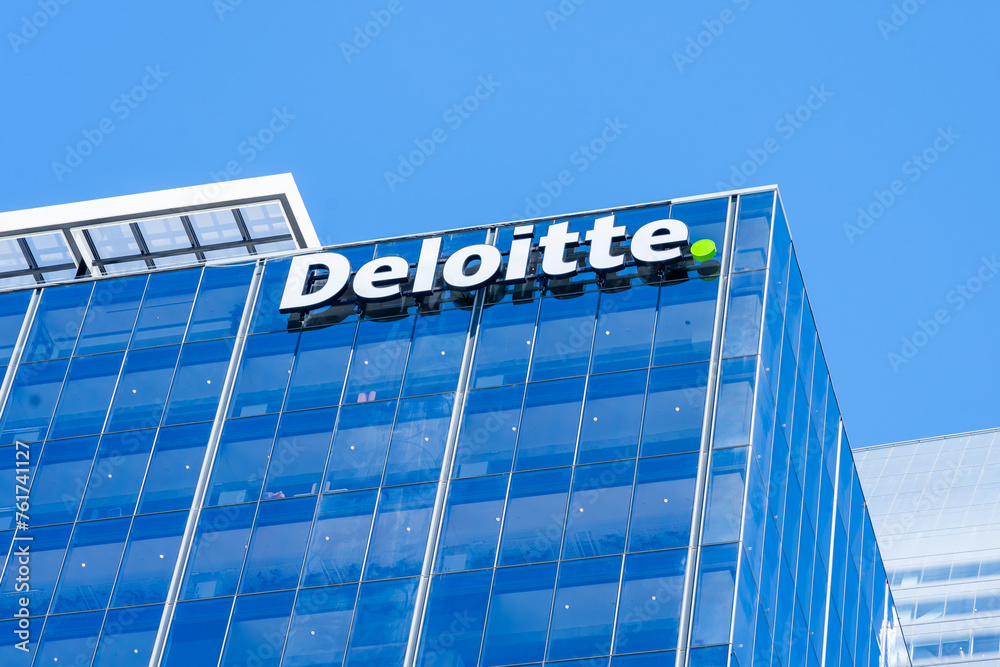 Auckland, New Zealand - February 1, 2024: Deloitte logo sign on the ...