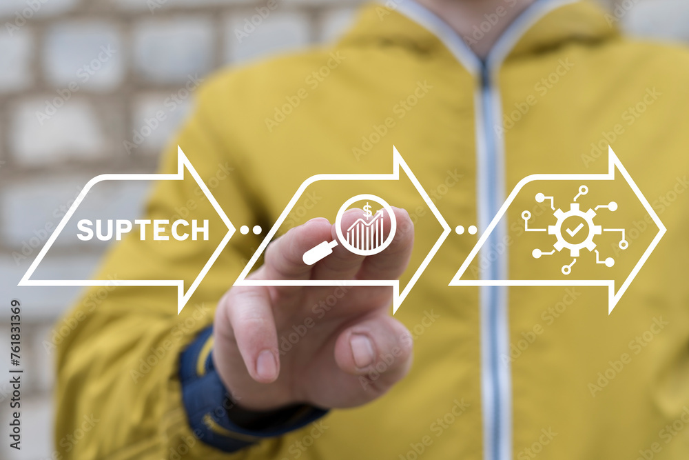 Man using virtual touch screen presses text: SUPTECH. Concept of ...