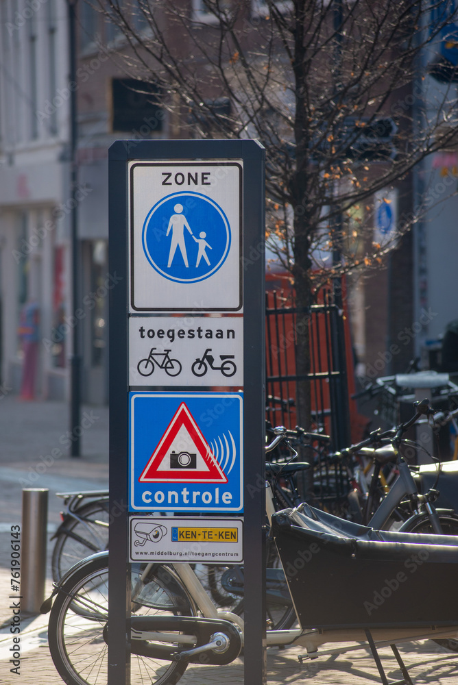 Traffic sign depicting the beginning of a pedestrian-only zone, with ...