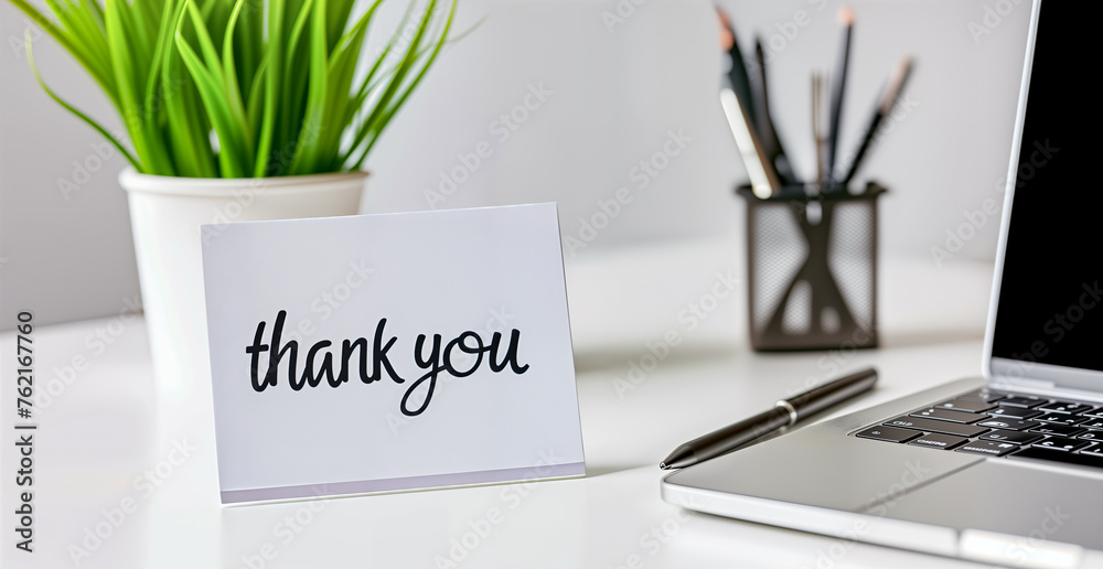 Top view of thank you concept on the sticky note paper. Office ...