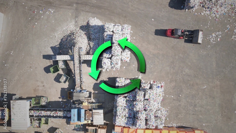 Recycle factory with garbage cubes waiting for sorting with graphic ...