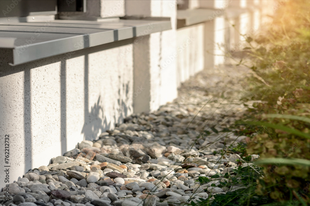 Drain Covering with Crushed Stone along Wall House. Modern Drainage ...