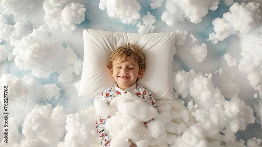 happy smiling little boy child in pajamas sleeping on white clouds in ...