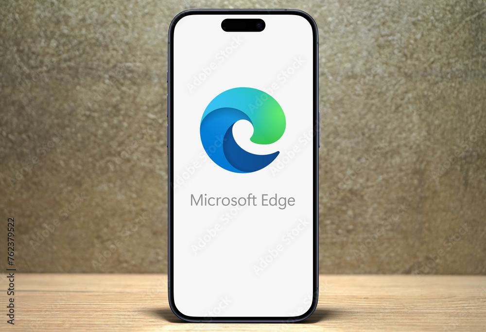 Microsoft Edge logo is displayed on a modern smartphone, browser, artificial intelligence ...