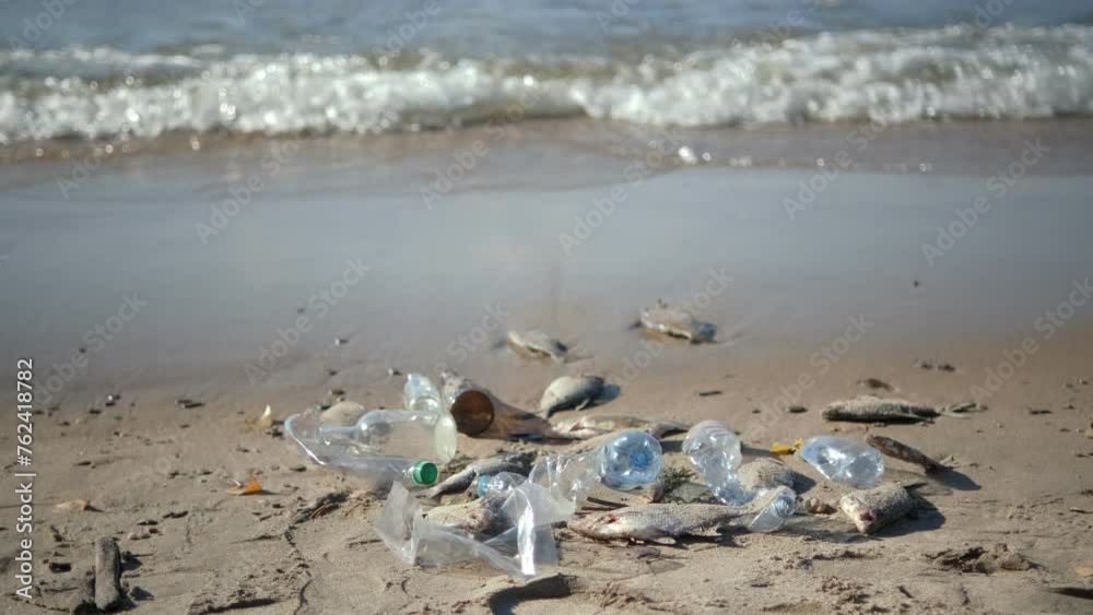 Plastic bottles litter polluted beach. Example of plastic in ocean and ...