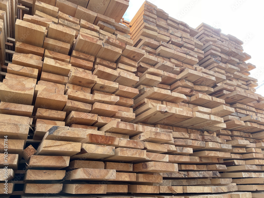 Stacked Timber Planks at a Lumberyard Awaiting Transportation. Stacked ...
