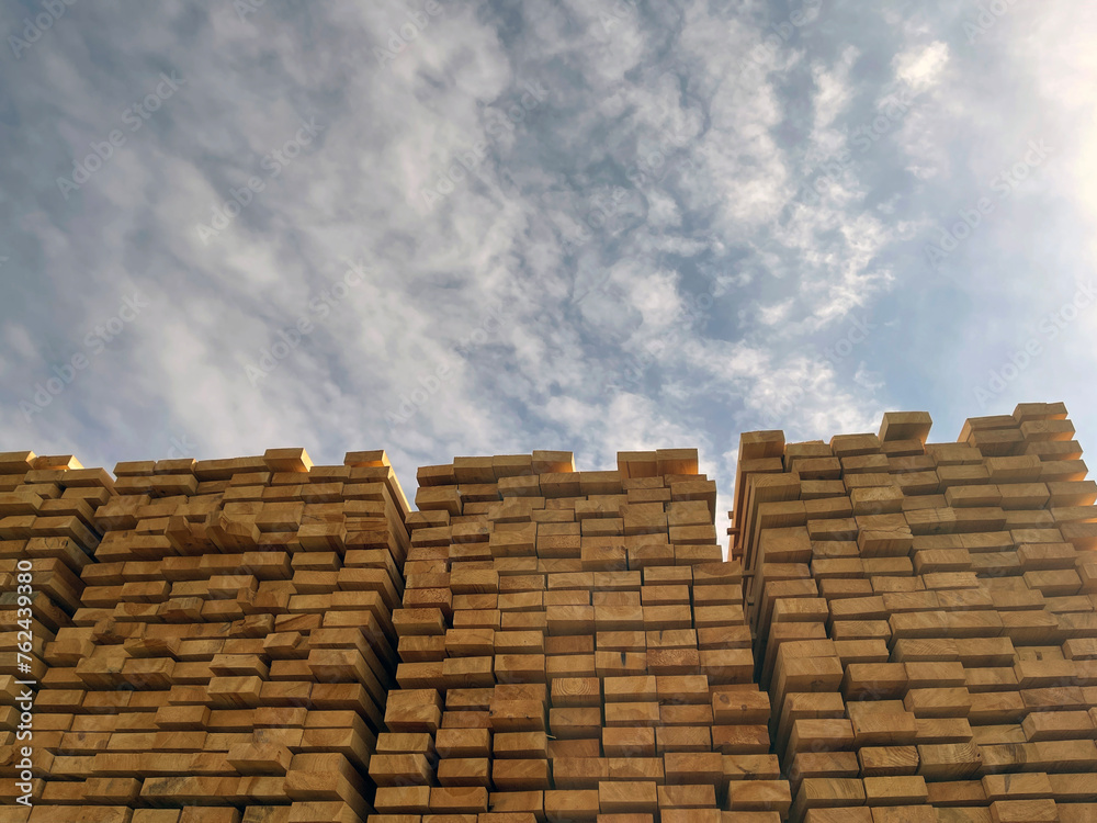 Stacked Timber Planks at a Lumberyard Awaiting Transportation. Stacked ...