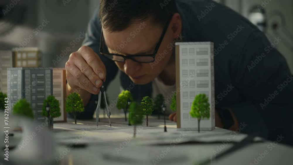 Active brainstorming in the office, a young architect carefully ...