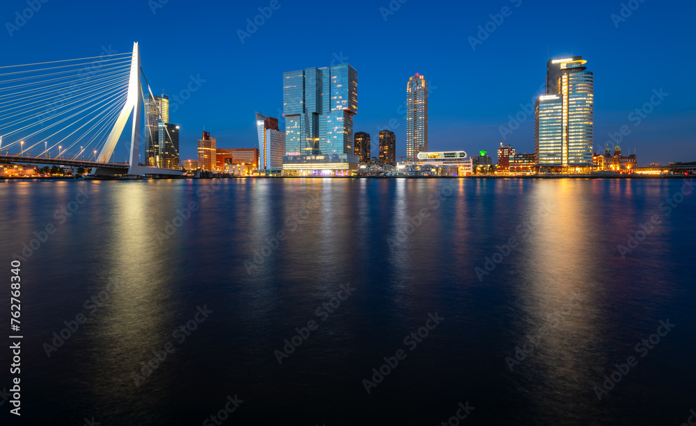 Panoramic view of Rotterdam night time skyline with modern buildings ...