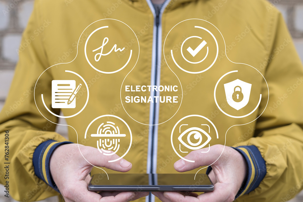 Electronic Signature Concept. Electronic Signing. Man holding phone and ...