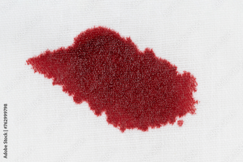 Drops of blood stains on white fabric. blood splatters on clothes. red ...