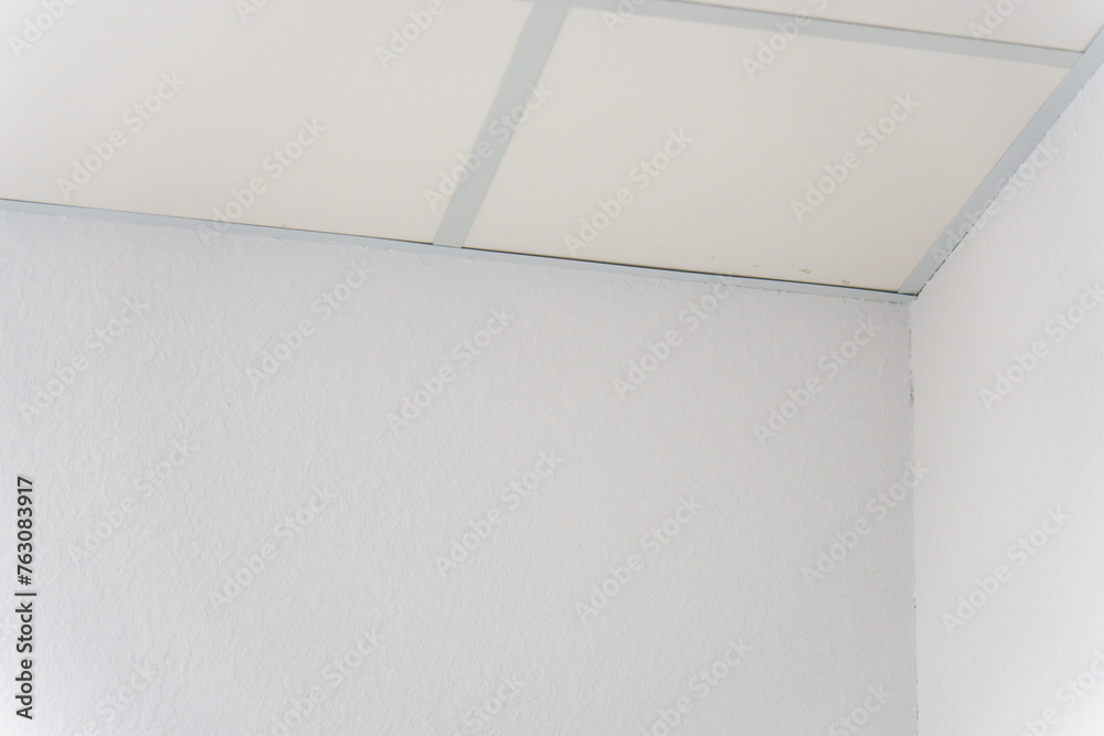 Parts of the ceiling decor in the corner, suspended ceiling made of ...