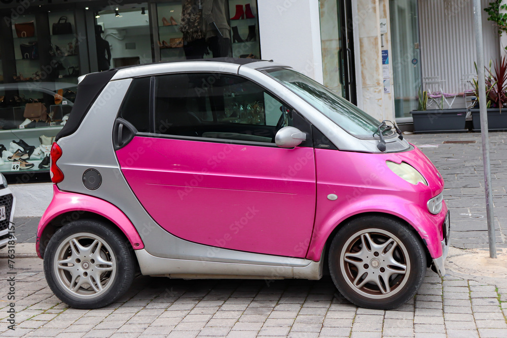 Rhodes, Greece- April 15, 2023: Bright pink Smart Fortwo, a two-seater ...