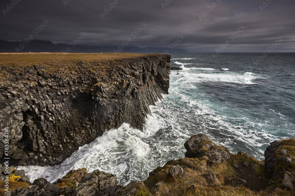 Lava cliffs along the seashore at Arnastapi, Snaefellsnes, western ...