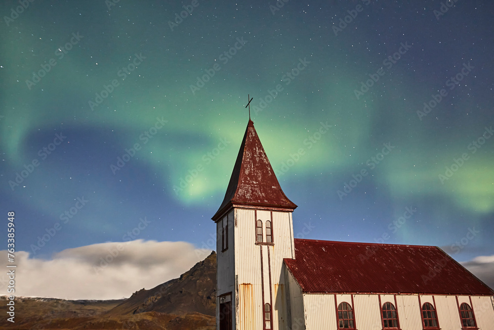 Northern Lights over a church in Hellnar, Snaefellsnes peninsula, west coast of Iceland; Hellnar ...