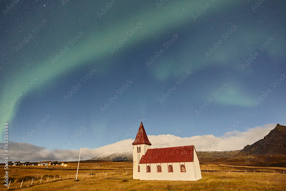 Northern Lights over a church in Hellnar, Snaefellsnes peninsula, west coast of Iceland; Hellnar ...
