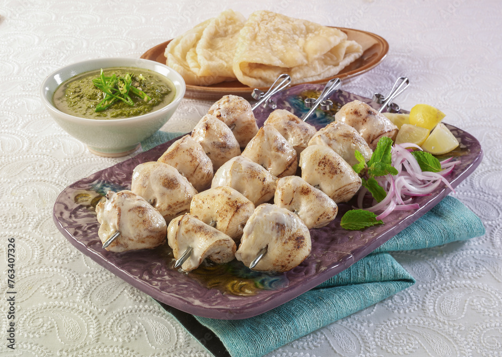Chicken Malai Boti with Puri Paratha and Chutney. Malai boti is a ...