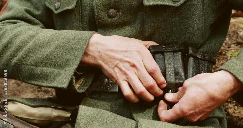 World War II German Soldier Cleaning Rifle. Soldier Preparing Weapon ...